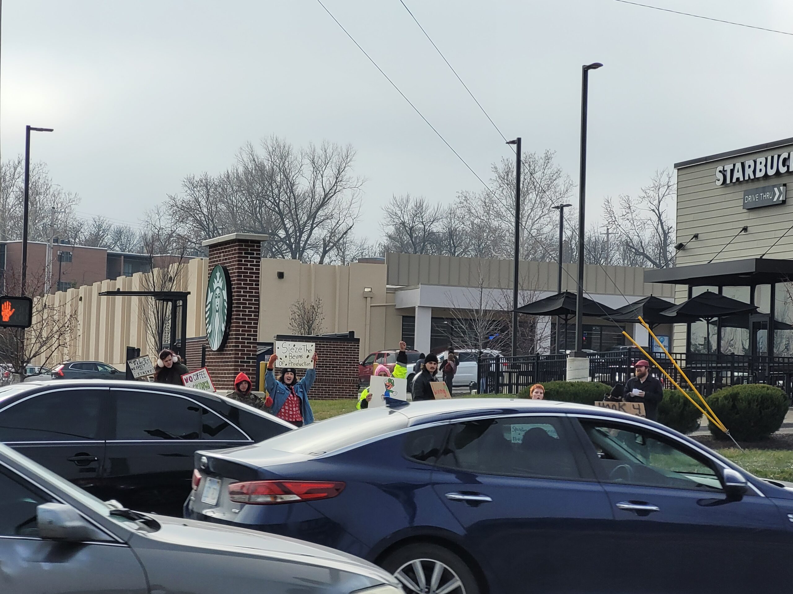 Starbucks workers strike outside of 23rd Street store as part of ...